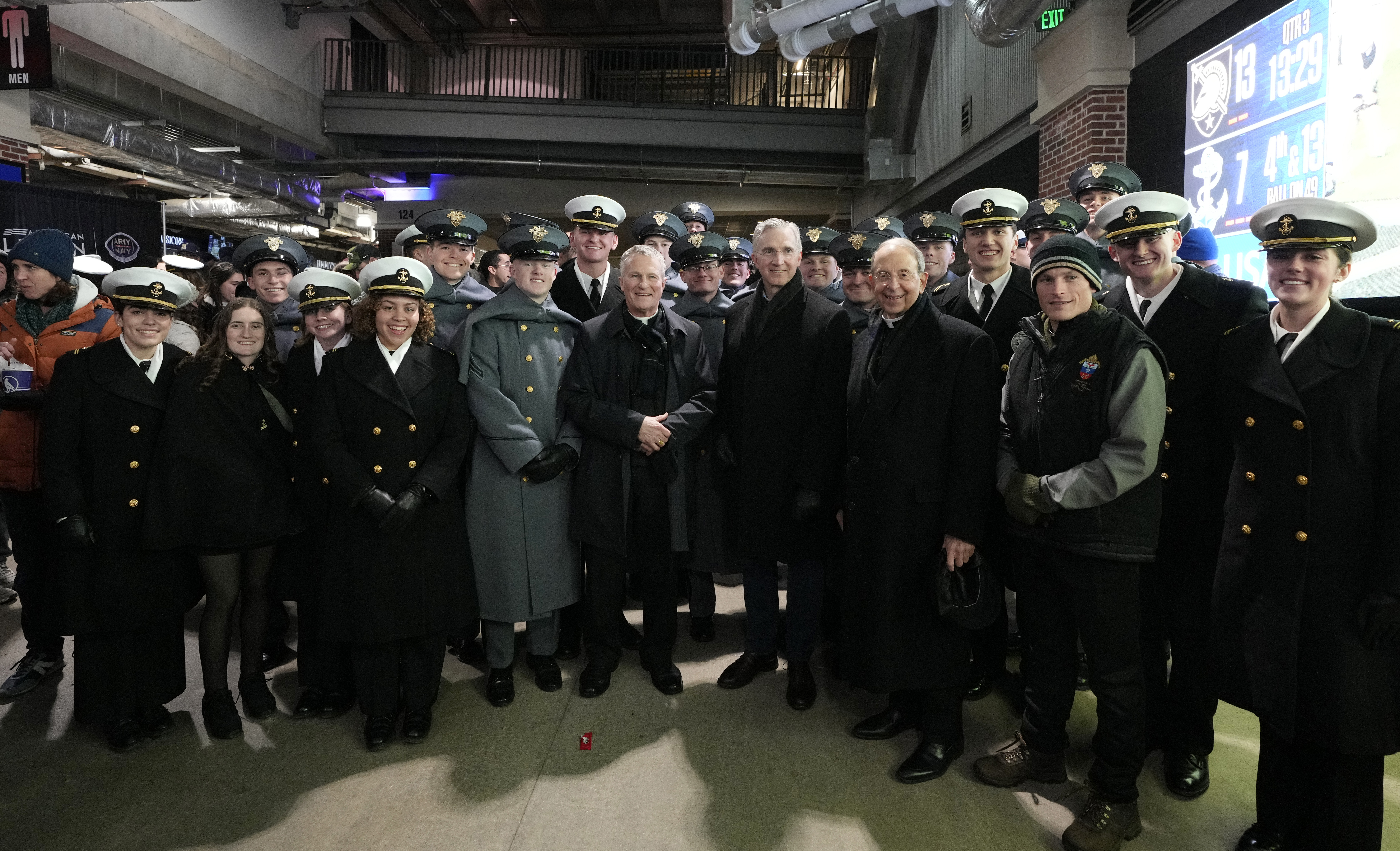 A Rivalry Set Aside: Army Cadets and Navy Midshipmen Unite in Halftime ...